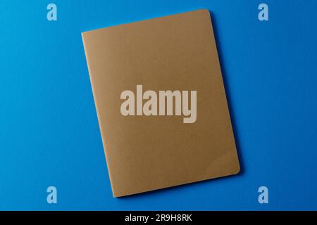 Close up of beige notebook with copy space on pink background Stock ...