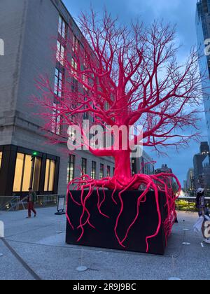 The old tree is a pink and red 25 foot tall sculpture comprised of man ...