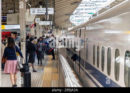 Shinkansen bullet train platforms April 2023, passengers wait to board ...