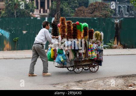 Hanoi, Vietnam-April 2023; Close up of Vietnamese woman pushing a ...