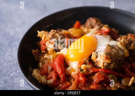 Moroccan meatballs stew with egg Stock Photo - Alamy