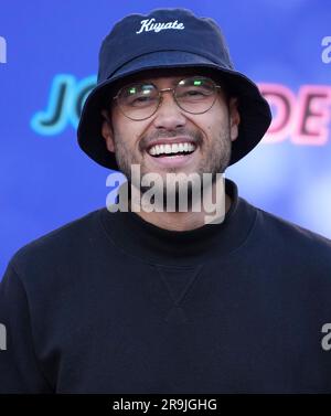 Travis Atreo arrives at the Los Angeles premiere of "Joy Ride," Monday ...