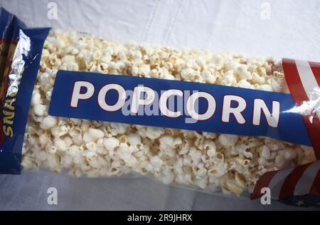 Signs and symbols, a popcorn package Stock Photo - Alamy