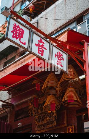 A storefront and building featuring traditional Chinese architecture in ...