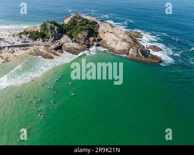 Aerial view of Diabo beach and Ipanema beach, Pedra do Arpoador. People sunbathing and playing ...