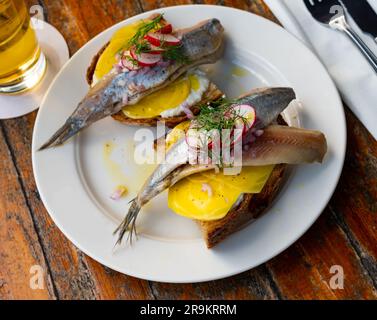 Traditional dish of Dutch cuisine is Haring Stock Photo - Alamy