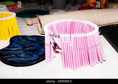 Tear-off tickets for a charity win-win lottery on the table among the ...