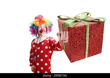 Funny clown with a gift present box isolated on white background Stock ...