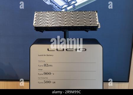 A Lucid Air electric car battery module sits on display inside a ...