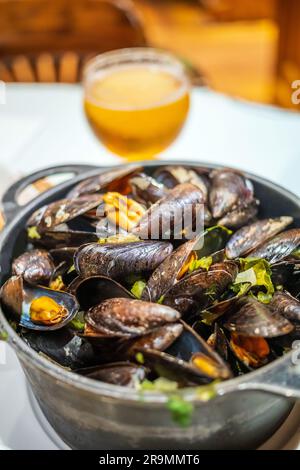 Traditional Belgian steamed mussels in Belgium Stock Photo - Alamy