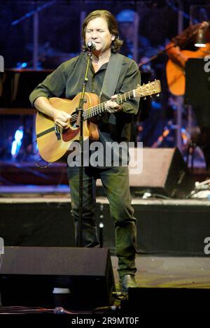 Australian Aboriginal artist Stephen Pigram performs as part of the ...