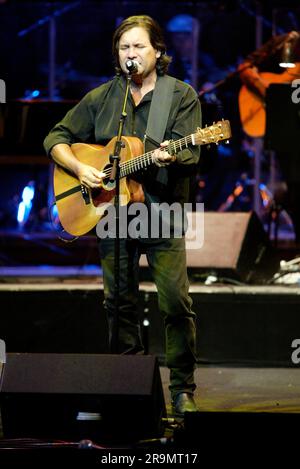 Australian Aboriginal artist Stephen Pigram performs as part of the ...