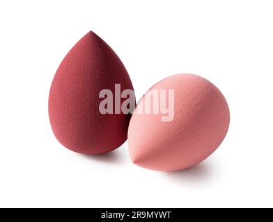 An egg-shaped makeup sponge placed on a white background Stock Photo ...