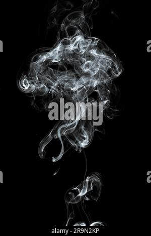Cigarette with stick on light background Stock Photo - Alamy