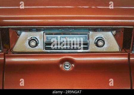 Old car radio inside a classic American car with chrome dashboard Stock ...