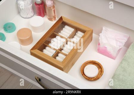 Storage of tampons and different hygiene products in white drawer Stock ...