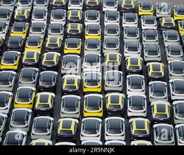 Pure geometry - endless rows of newly imported cars arrayed onshore in ...