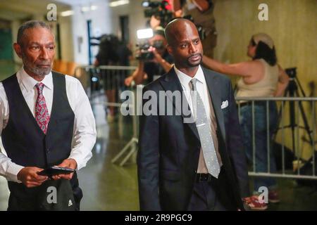 Donte Mills, a lawyer for Jordan Neely's family, speaks to members of ...