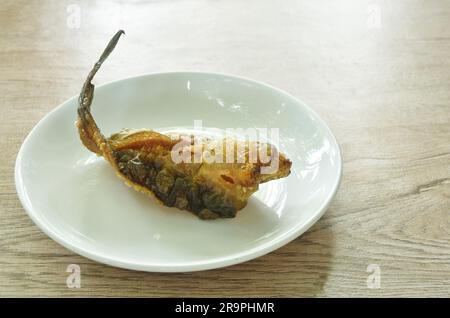 deep fried snake skin catfish or gourami on dish Stock Photo - Alamy