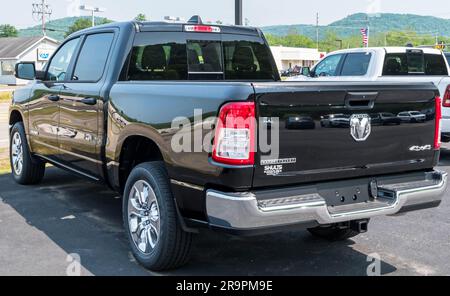 A new Dodge Ram 1500 four door pick up truck for sale at a dealership ...