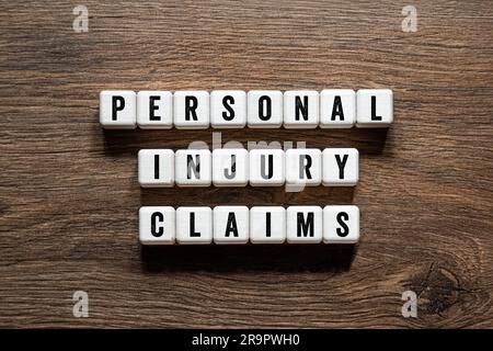 Concept of Personal Injury Claims write on sticky notes isolated on ...