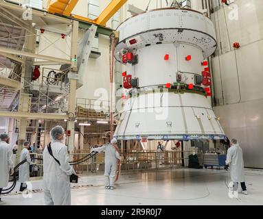 Artemis II SM Move to Fast Cell. A view looking up from beneath the European Service Module (ESM ...