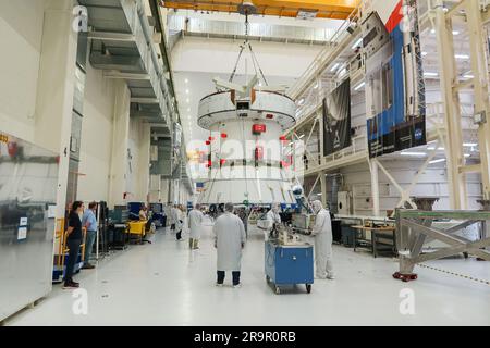 Artemis II SM Move to Fast Cell. Engineers and technicians monitor the progress as the European ...