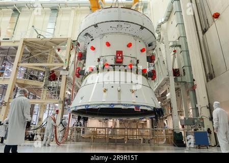 Artemis II SM Move to Fast Cell. Engineers and technicians monitor the progress as the European ...