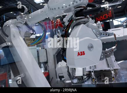 Munich, Germany. 28th June, 2023. A robot arm from ABB is on display at ...