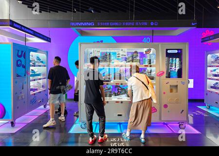 SHANGHAI, CHINA - JUNE 28, 2023 - Customers inside the Nike flagship ...