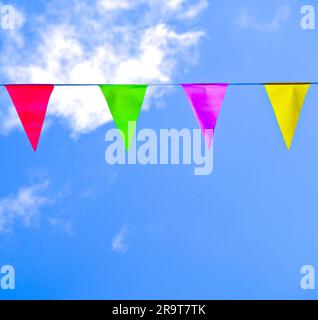 Vivid saturated triangle pennants / flags in all colors of the rainbow ...