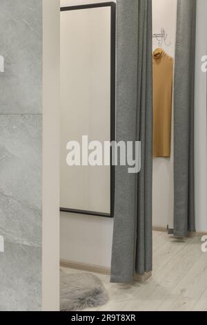 Dressing rooms in fashion store. Interior design Stock Photo - Alamy