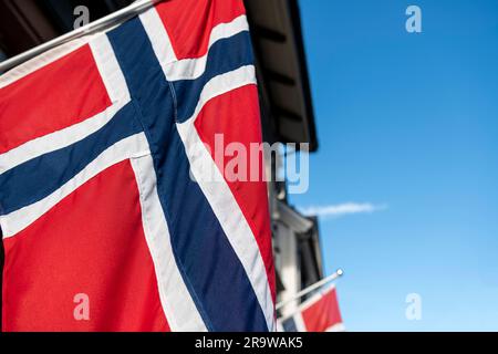 Norwegian flag in Tromso city centre Stock Photo - Alamy