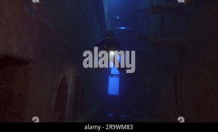 Scuba diver with lantern floats inside of ferry Salem Express shipwreck ...