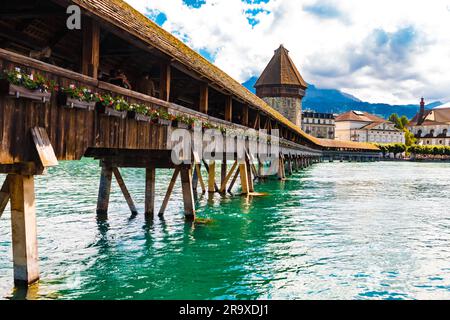 Covered bridge is timber-truss bridge with roof and siding, covered ...