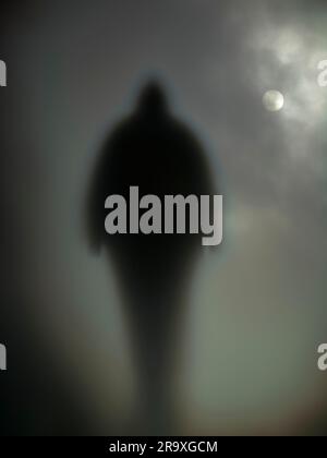 Dark entity in an overcast full moon night Stock Photo - Alamy