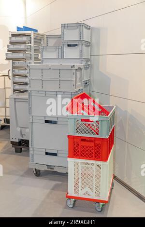 Plastic Boxes With Dolly Cart Wheels Pallet Shipping Delivery Stock ...