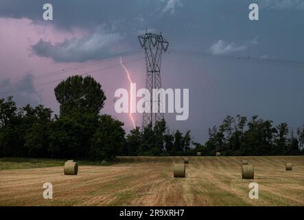 Lightning strike on the energy transition power line Stock Photo - Alamy