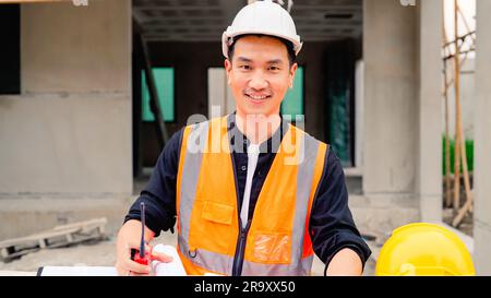 Portrait of cvil engineer with safety uniform working at construction ...