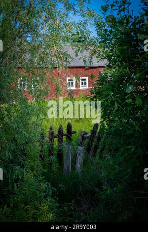 White rural house with fence in winter landscape, Norway Stock Photo ...