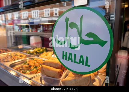 LONDON- APRIL, 2023: Halal sign in chinese food stall in Tooting, south ...