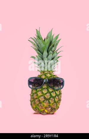 Creative pineapple with sunglasses on summer background Stock Photo - Alamy