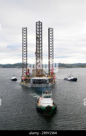 Oil, gas rig being towed past Teesside Offshore Wind farm at Redcar on ...