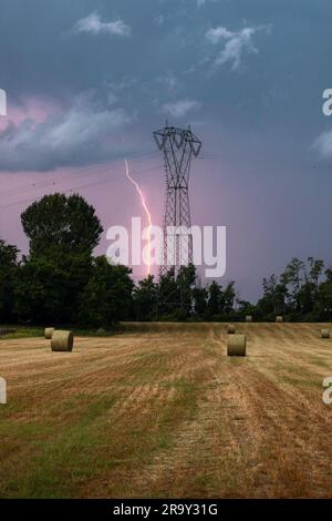 Lightning strike on the energy transition power line Stock Photo - Alamy