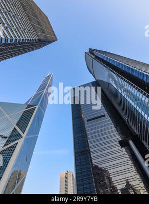 Bottom angle view of glass blue building Stock Photo - Alamy