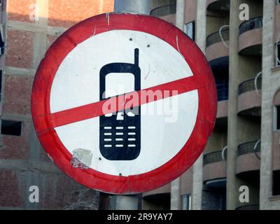 No cell phone use during driving sign, a traffic signboard shows that ...