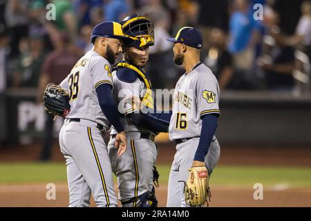 Milwaukee Brewers' Blake Perkins, right, celebrates his two-run home ...