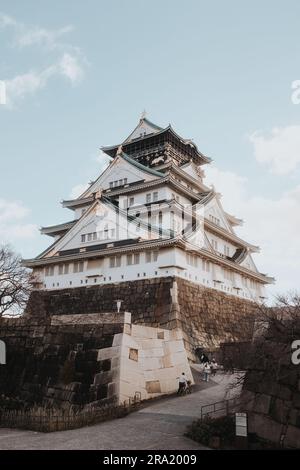 Osaka castle tower closeup with blue sky, Japan Stock Photo - Alamy