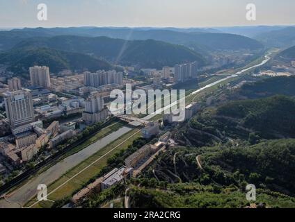 Yan'an. 26th June, 2023. This aerial photo taken on June 26, 2023 shows ...
