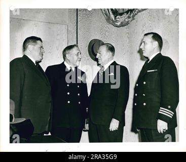 Photograph of Four Men in Military Uniform, Two Officers Shaking Hands ...